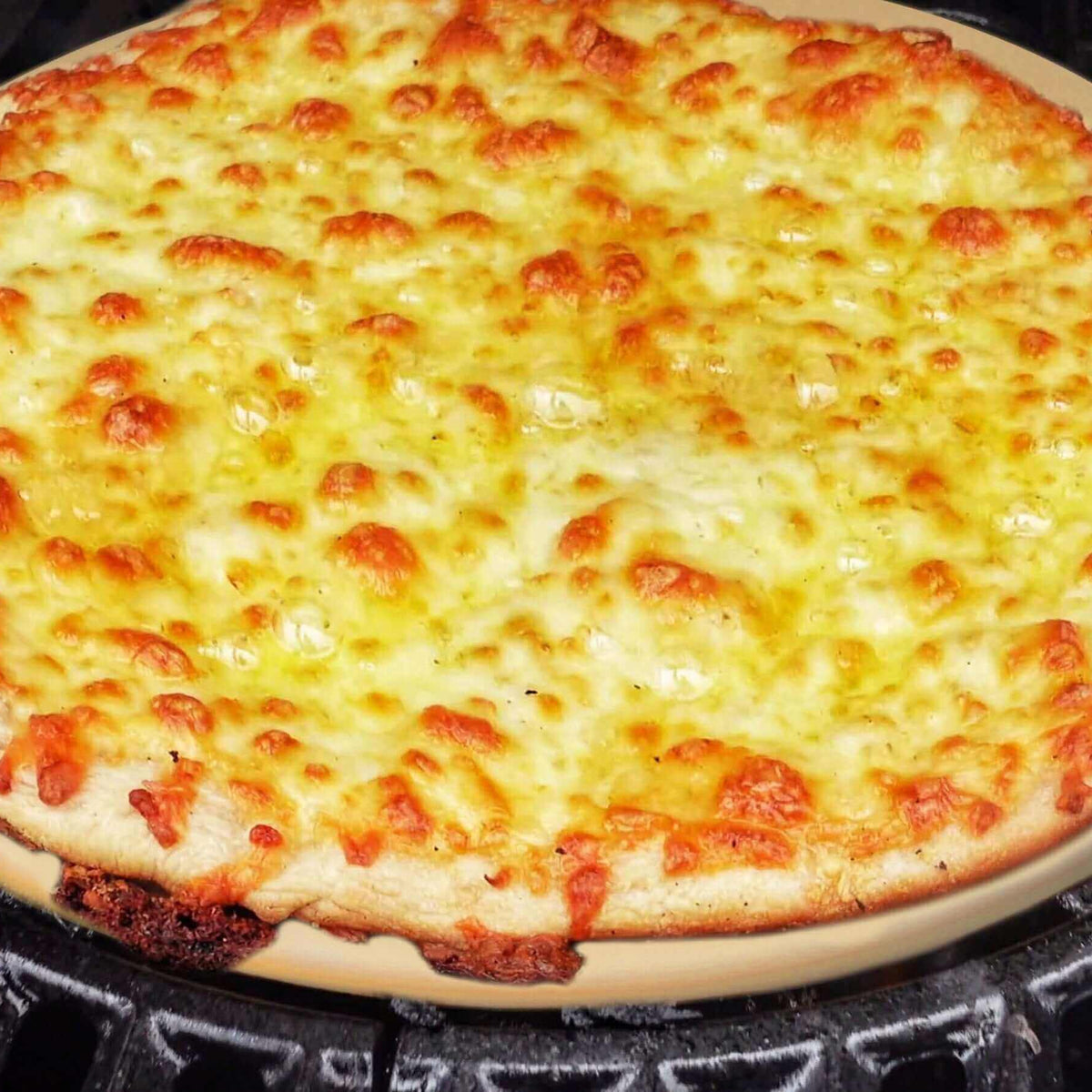 Irresistible Cheesy Garlic Pizza Recipe – Monument Grills
